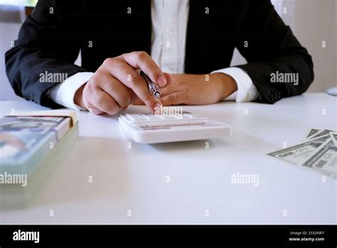 Accountant Working Man Uses Calculator With Spreadsheet Document