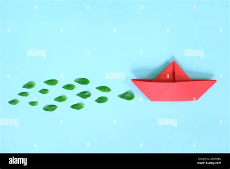 Clean Energy For Sea Travel And Sustainable Maritime Transport Concept Paper Boat Emitting