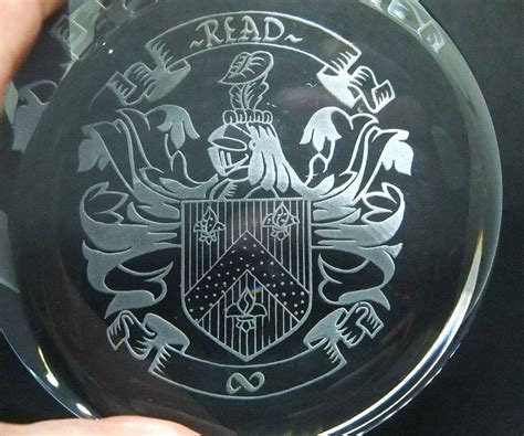 Paperweights And Dumps A Vintage Solid Glass Paperweight With Coat Of