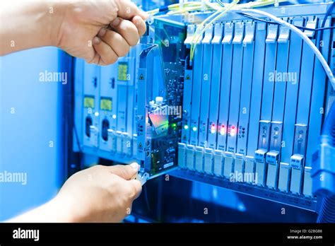 People Fix Core Switch In Network Room Stock Photo Alamy