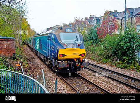 Class 68034 At Rear Of Transpennine Train Bound For York From