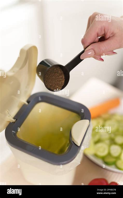 Person Making A Compost At Home Female Composting Food Leftovers With Bokashi Ferment Woman