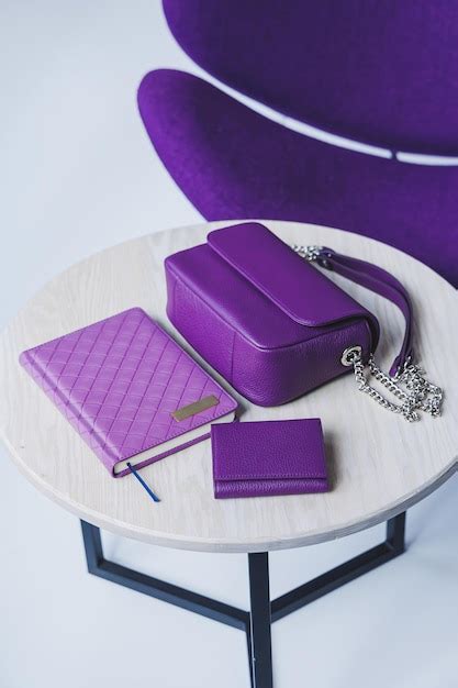 Premium Photo A Leather Wallet And A Notebook Lie On The Table Small Womens Handbag