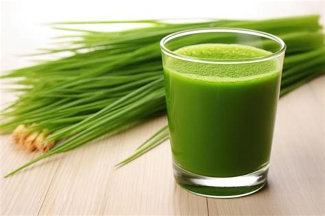 Premium Ai Image Wheatgrass Juice Glass With Fresh Wheatgrass Around