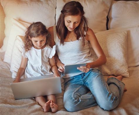 Mom Girl And Technology In Home For Streaming Movies Bonding And Top