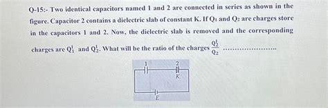 Solved Q Two Identical Capacitors Named And Are Chegg Com