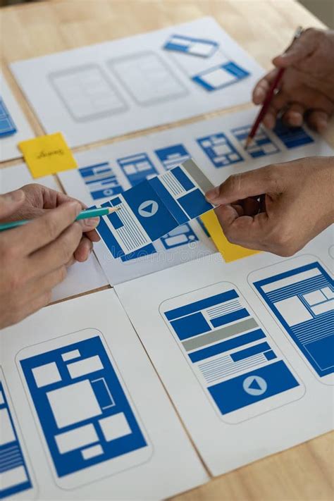 the web ux ui design team is writing code and layers to customize the