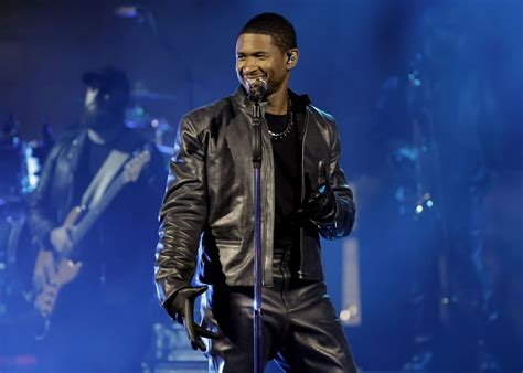 usher has show taken away from after ambitious fan steals microphone
