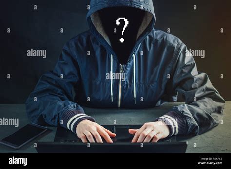 Anonymous Hacker Programmer Uses A Laptop To Hack The System Stealing Personal Data Creation