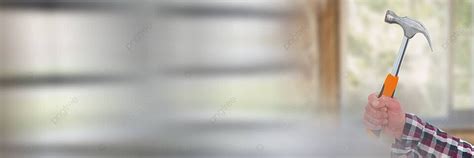 Transitioning Windows On A Building Site Hammer In Hand Photo