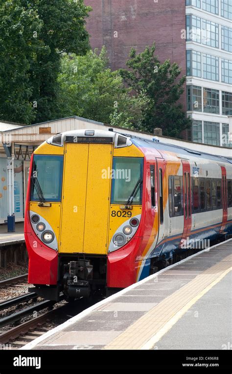Class 458 Juniper Passenger Train In South West Trains Livery Waiting