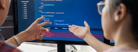 Premium Photo Female Programer Explain While Pointing Code Displayed