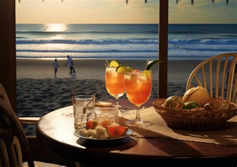 Premium Ai Image A Beachfront Restaurant Scene With Sex On The Beach Cocktails And A View Of
