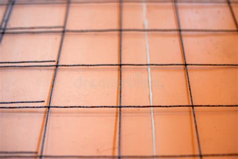 Installation Of Heated Floors In The House Reinforcing Mesh On Polystyrene Foam Insulation