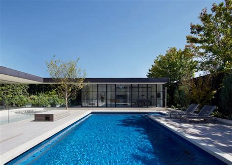 B E Architecture Adds Gridded Glass Rooms To Australian House