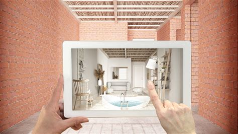 증강 현실 개념 실내 건설 현장에서 가구 및 디자인 제품을 시뮬레이션하는 데 사용되는 Ar 응용 프로그램과 핸드 홀딩 태블릿 욕조가있는 나무 평화로운 욕실 가구에 대한 스톡