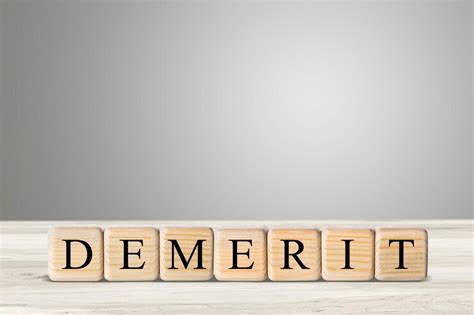 Premium Photo Wooden Cubes Form A Word Business And Demerit Concept