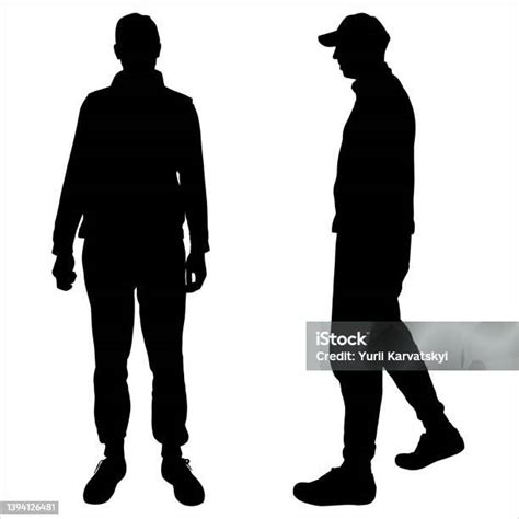 흰색 배경에 고립 된 남자의 검은 실루엣 남자 젊은 남자는 정면 위치에서 움직이지 않고 똑바로 서 있습니다 프로필 위치에서