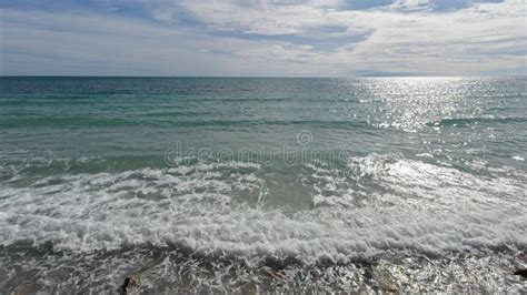 Sea Waves At Sunset Sea Waves Crash On The Rocks Of The Coast Creating