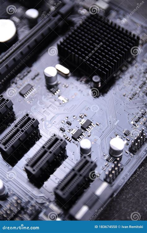 Computer Motherboard And Electronical Components Cpu Gpu Memory And Different Sockets For Video