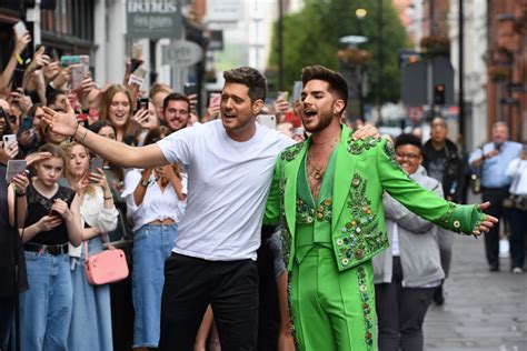 Right Out Of A Film Scene Michael Bublé And Adam Lambert Leave Nyc Speechless With Surprise