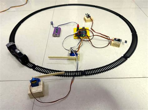 automatic railway crossing system with ir sensors sr robotics
