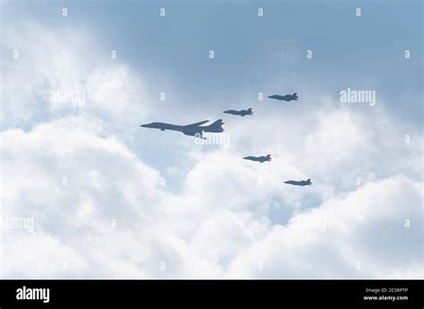 New York Ny July 4 2020 B 1 Bomber With Escort Of F 22 Fighter