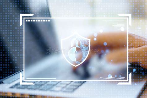 digital lock and shield icon overlayed on a blurred laptop background