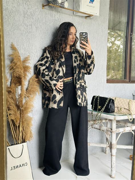 ტანსაცმელი გამოწერით Added A New Photo ტანსაცმელი გამოწერით