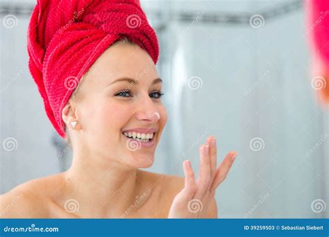 Blond In A Bath With A Red Towel On The Head Stock Image Image Of