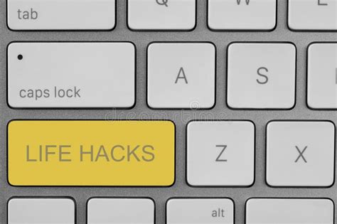 Yellow Button With Words Life Hacks On Laptop Top View Stock Image