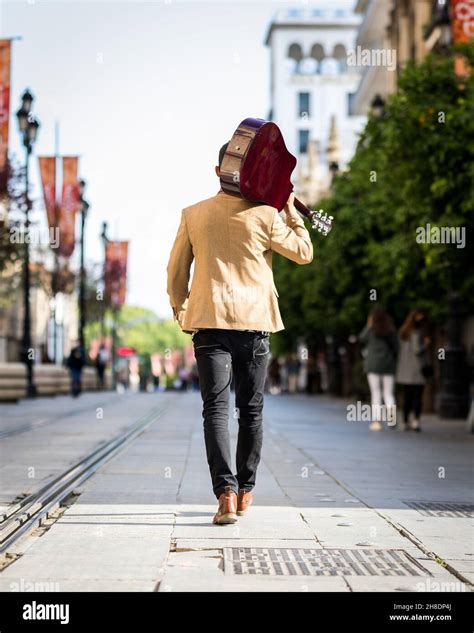 Person Walking Down The Street