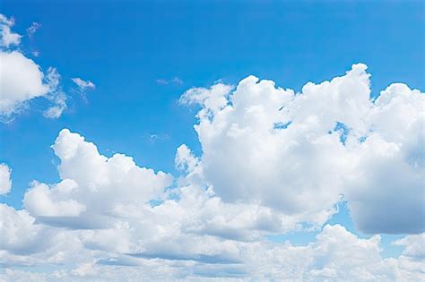 Premium Photo Captivating Blue Sky A Stunning Canvas Of Puffy White Clouds
