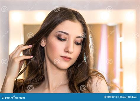Beautiful Girl Face Portrait With Makeup On Makeup Mirror Backgr Stock