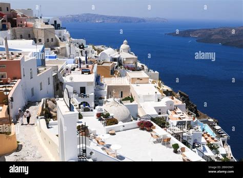 Cityscape Of Fira Town With White Houses And The Caldera In Santorini