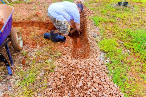 Underground Storm Sewers Are Replaced In Trench With A Groundwater