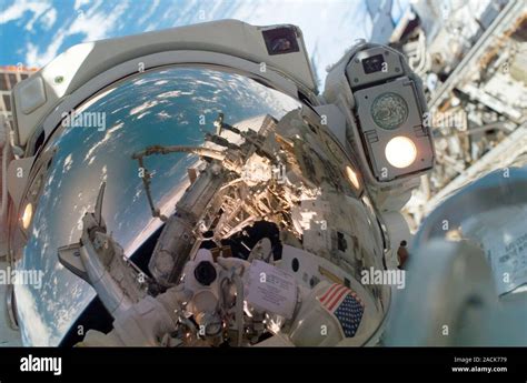 astronaut self portrait flight engineer garrett reisman taking a self
