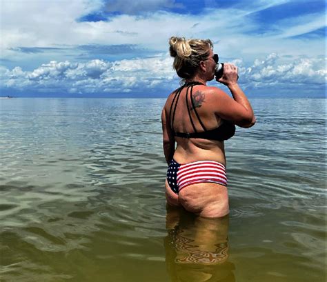 Having A Cool Coors Lite Soaking In The Sun With Water Lapping On My