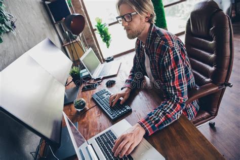 Photo Of Professional Young Blond Hair Hacker Guy At Loft Design Modern