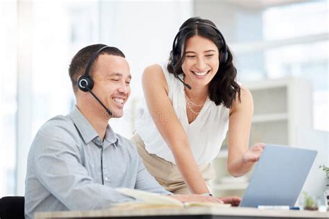 Its So Simple Ill Show You Two Call Centre Agents Working Together On