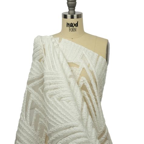 metallic white overlapped nested triangles luxury burnout brocade