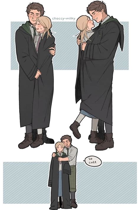 two people are hugging each other while one person is wearing a