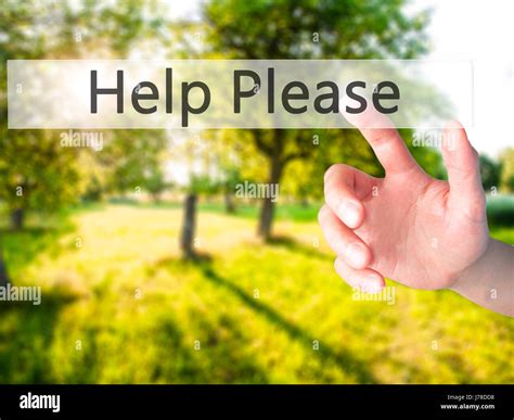 Help Please - Hand pressing a button on blurred background concept . Business, technology ...