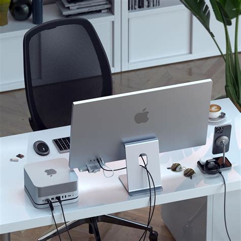 Minimalist White Desk Setup With Apple Computer