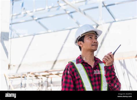 Asian Engineer Foreman Architect Worker Man Working At Building