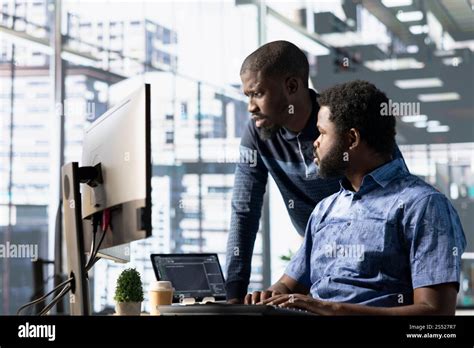 Data Engineering It Staff Members At Pc Desk Developing Machine