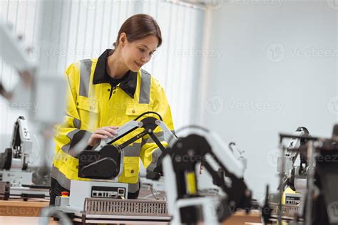 Engineer Women Learning Education In Industrial Robotics Program With Robot Arm Simulation Model