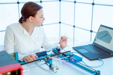 Female Student Sets Parameters Of Cnc Laser Plotter In University