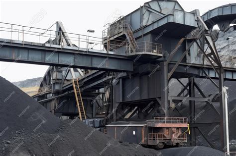 Premium Ai Image Mining Company Showing The Process Of Extracting Coal From Mine Shaft Created