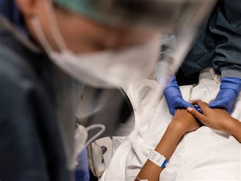 The Defining Photos Of The Pandemic — And The Stories Behind Them